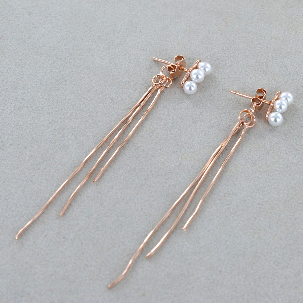 Orecchini in argento rosa a fili trilogy di perle Space Pearl Cuori ...